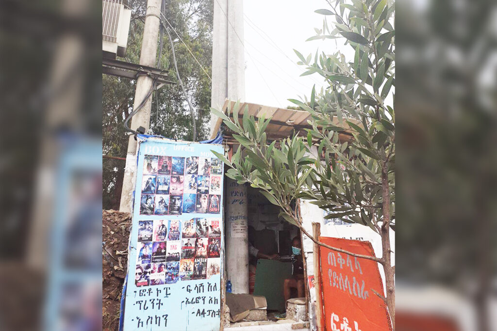 A shop surrounding utility post - Capital Newspaper